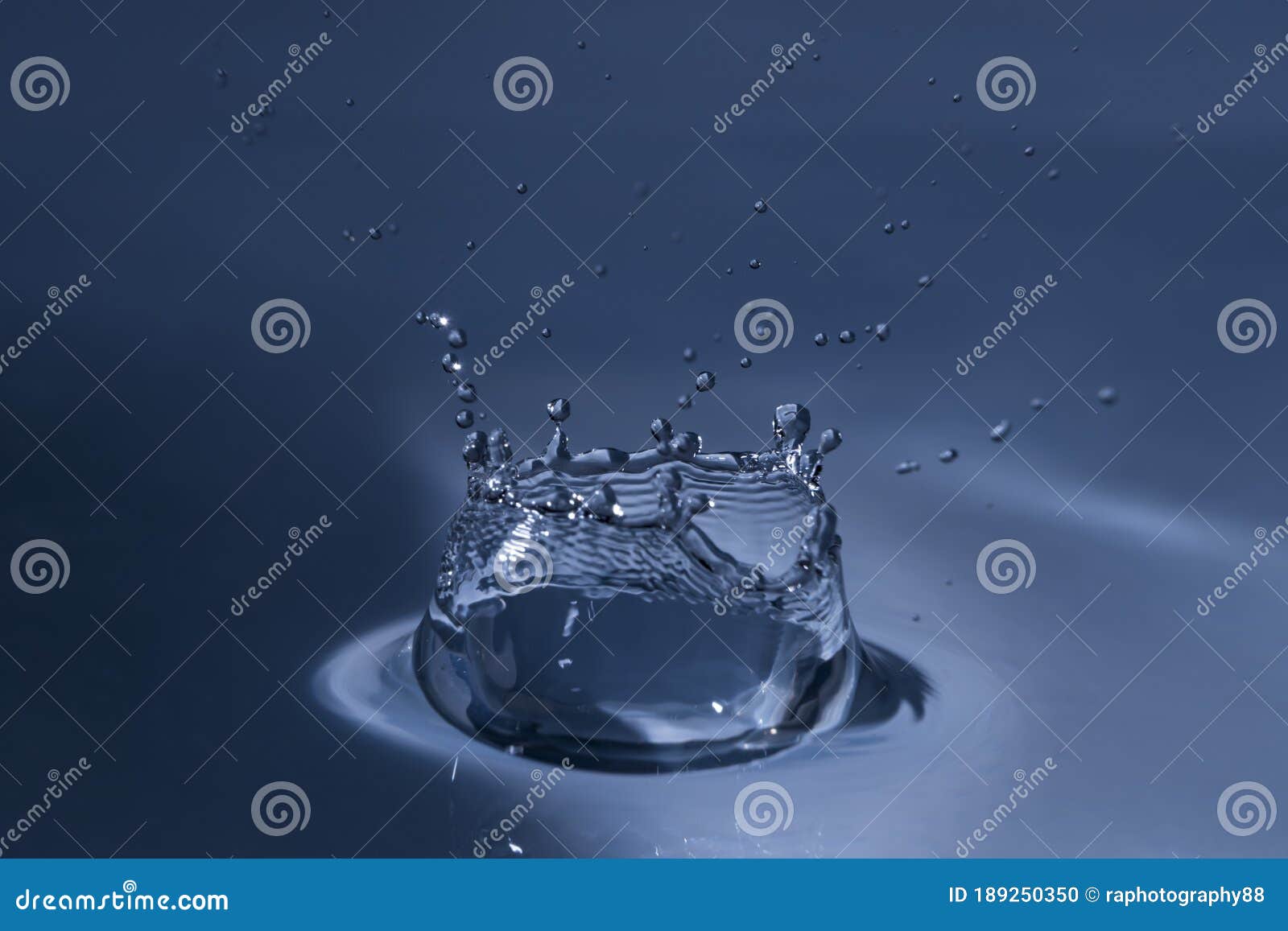 Splashing water drop stock photo. Image of physics, bead - 189250350