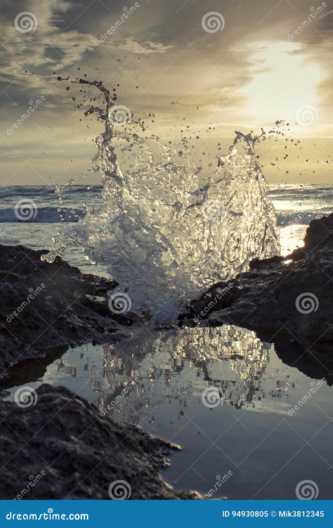 Splashing water in the sea stock image. Image of sand - 94930805