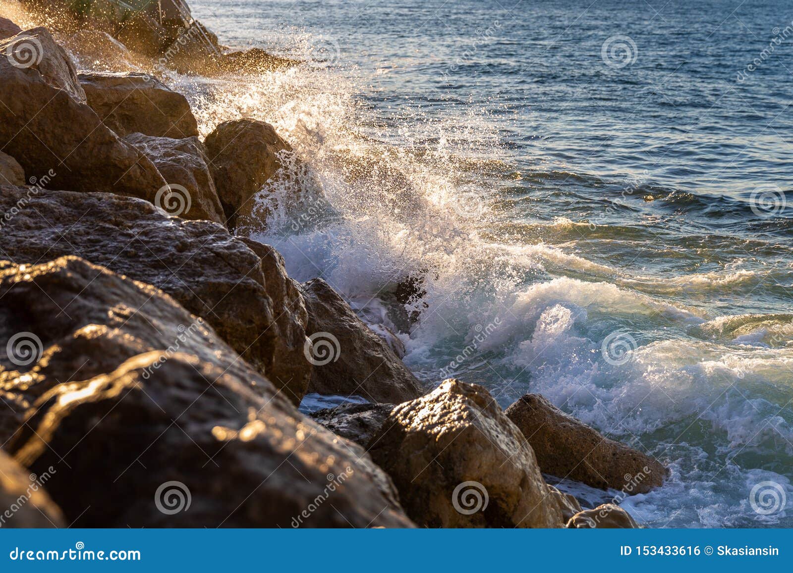 Splashing Water from Touching of Strong Wave on Rocks Stock Photo ...