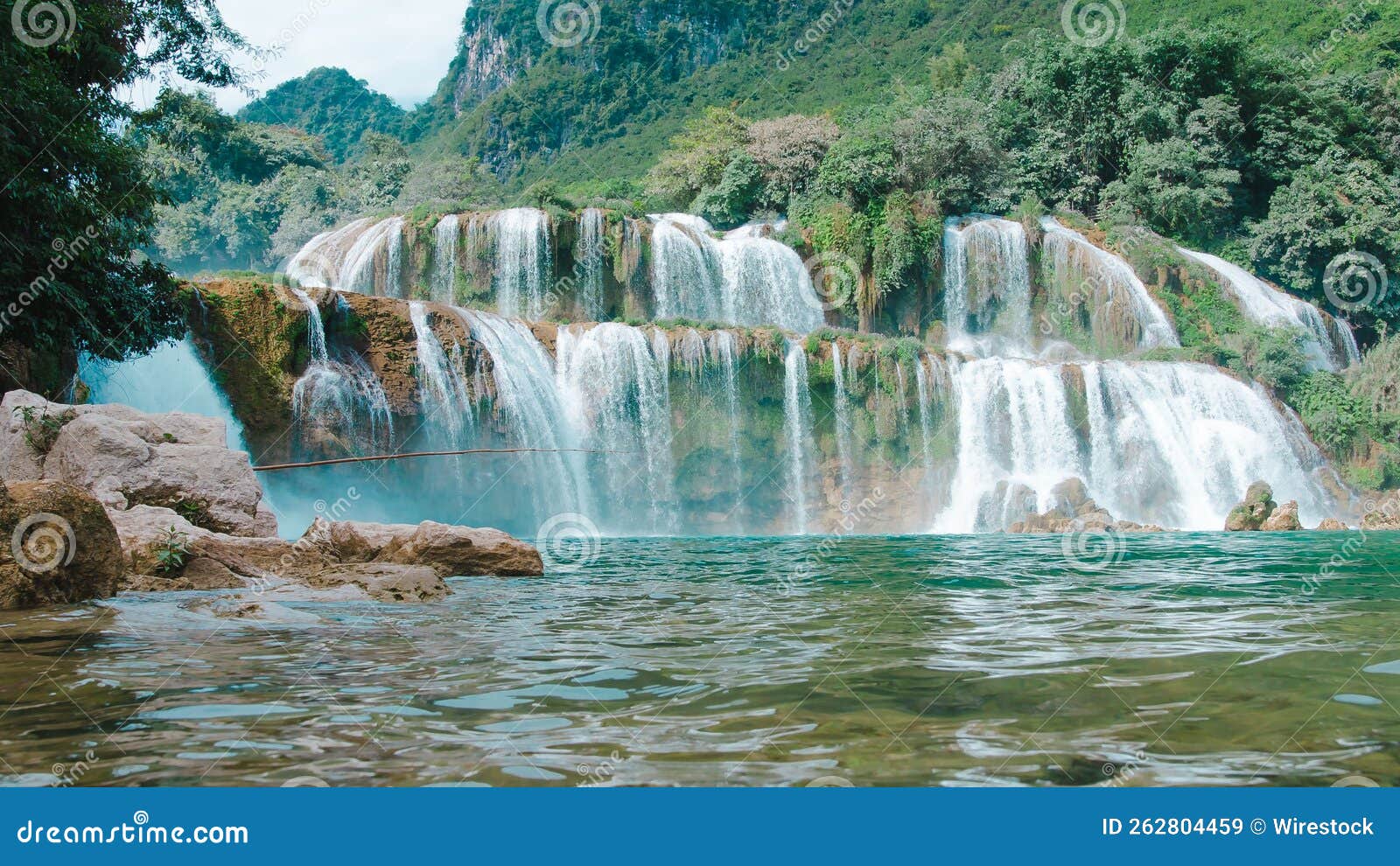 Splashing Water of the Waterfall in the Green Forest Stock Image ...