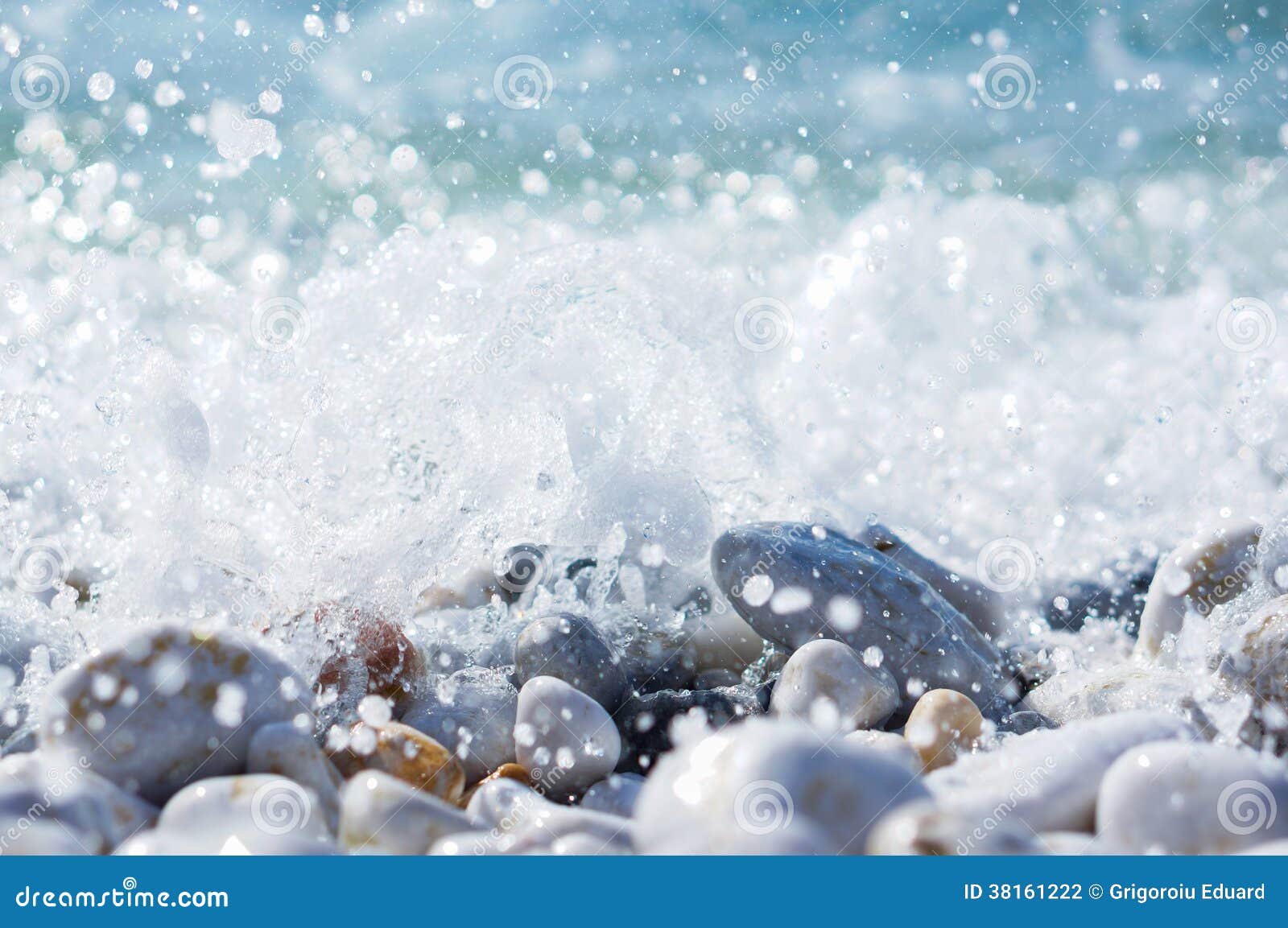 Splashing Waves Over Pebbles Stock Photo - Image of stone, breaking ...
