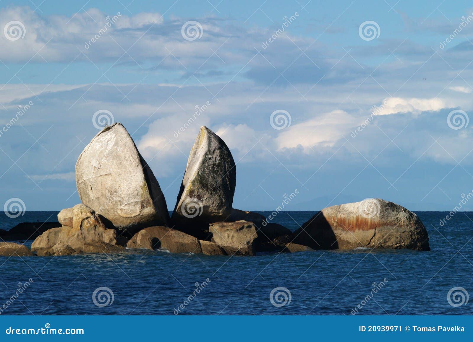 Split apple rock stock image. Image of geology, island - 20939971