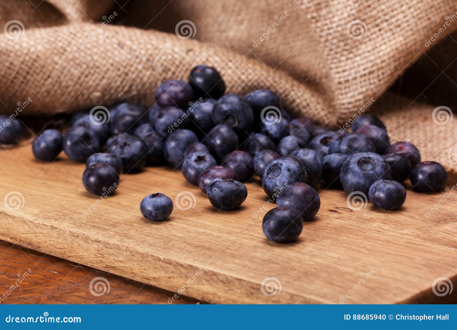 Split Blueberries on a Rustic Wooden Background Stock Photo - Image of ...