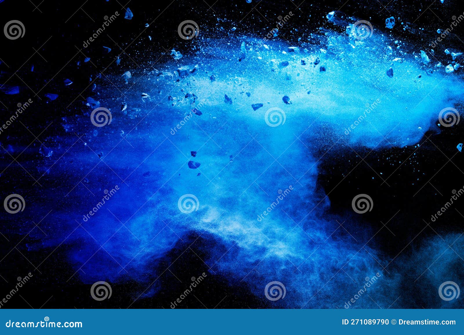 Split Debris of Stone Exploding with Blue Powder Against Black ...