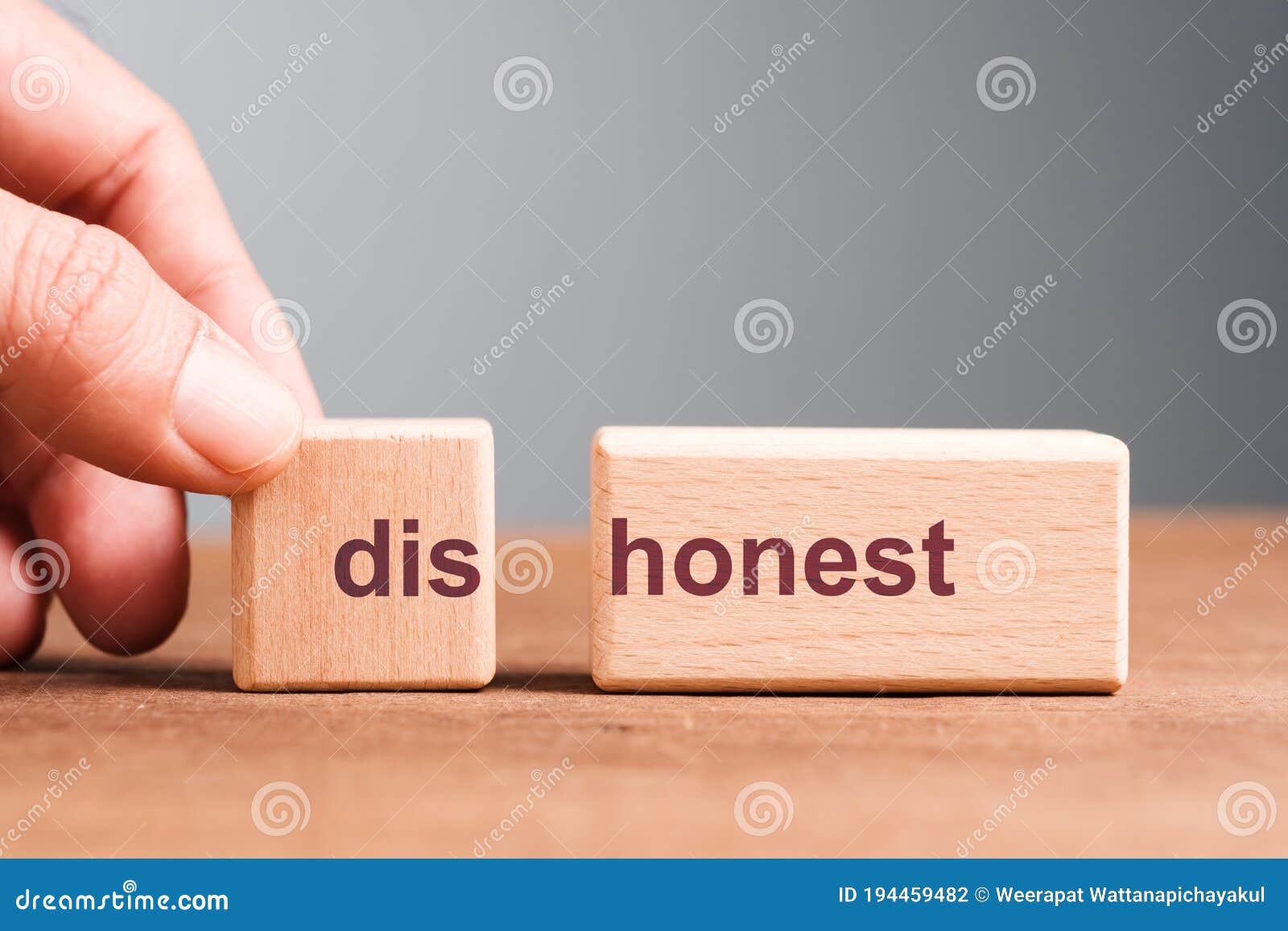 Honesty Or Dishonesty Symbol. Businessman Hand Turns Cubes And Changes ... Honesty Or Dishonesty Symbol. Businessman Hand Turns Cubes And Changes ...