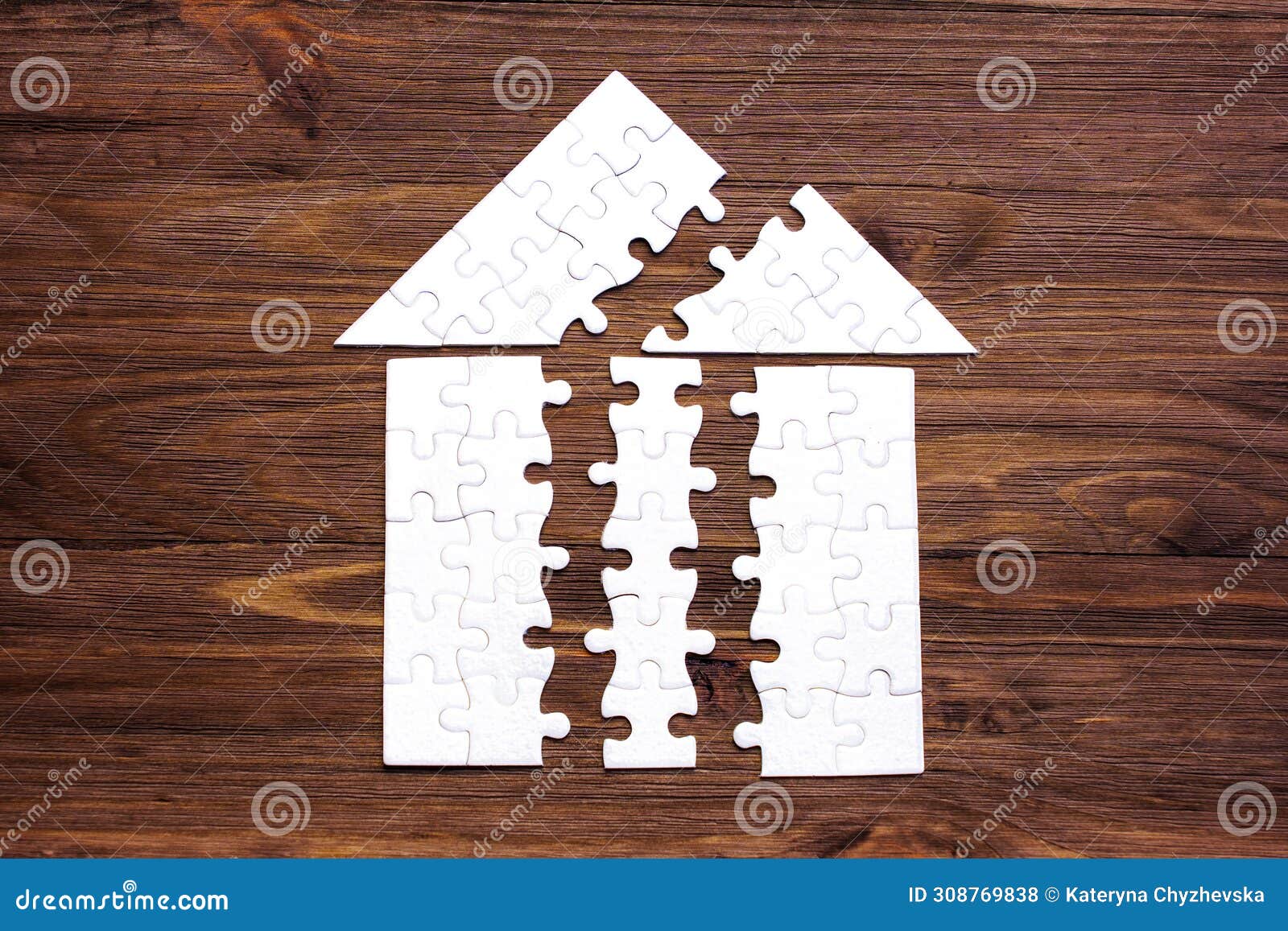 Split House Shape Made from Jigsaw Puzzle Elements Stock Photo - Image ...
