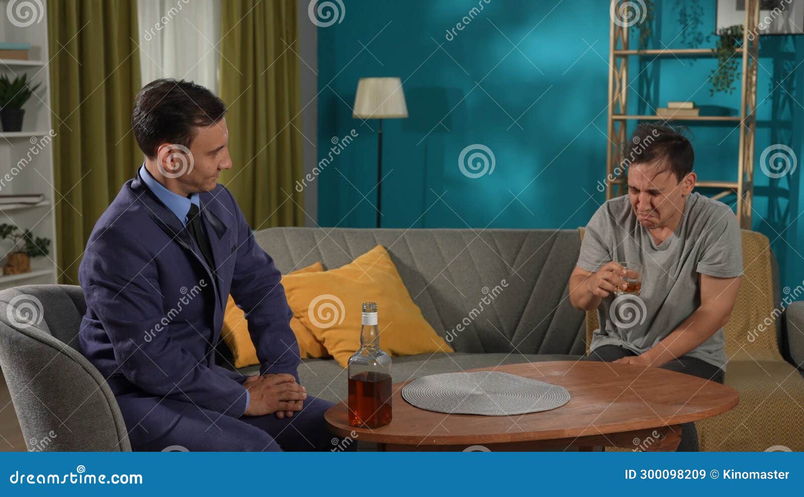 Split Personality. an Alcoholic Man Sits on the Sofa in Front of His ...