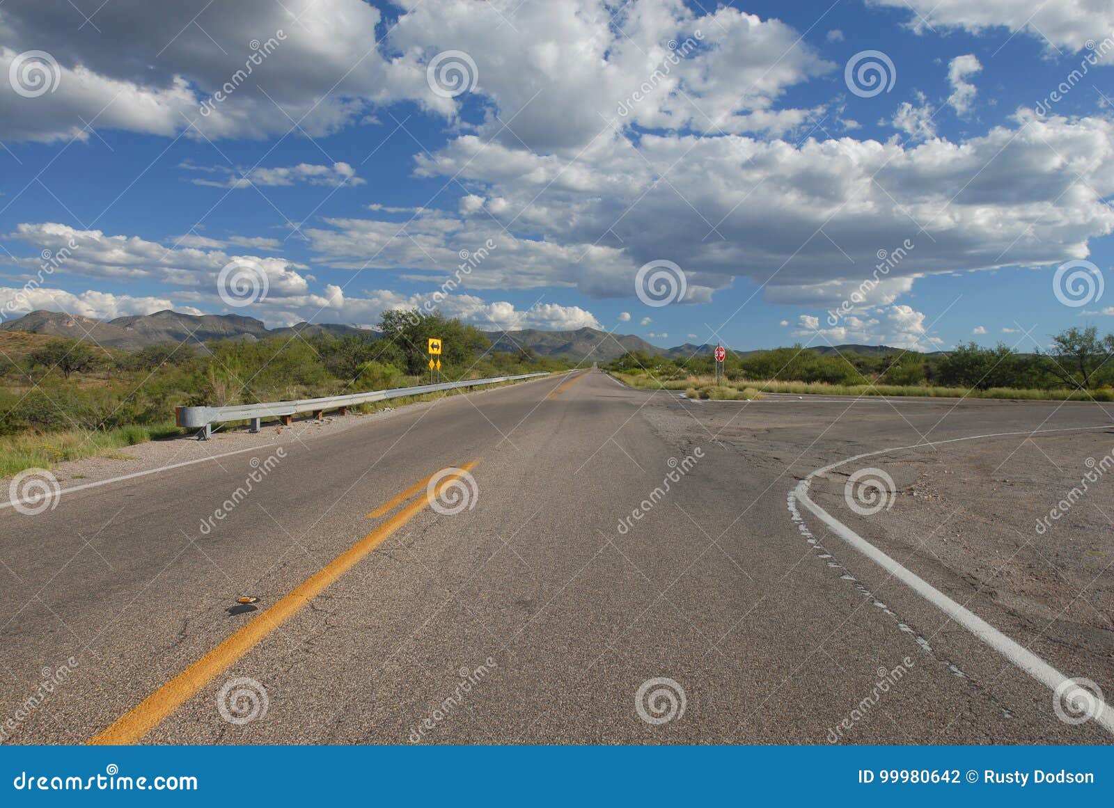 Split in the Road stock photo. Image of street, path - 99980642