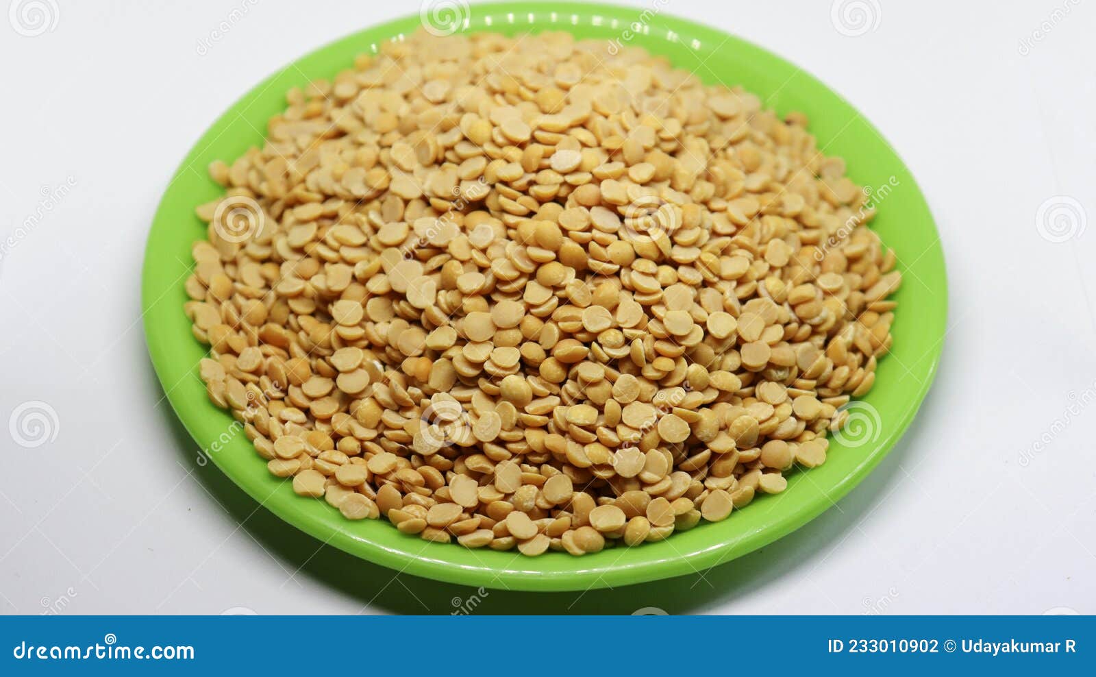 The Split Yellow Gram on the Plate are on a White Background Stock ...