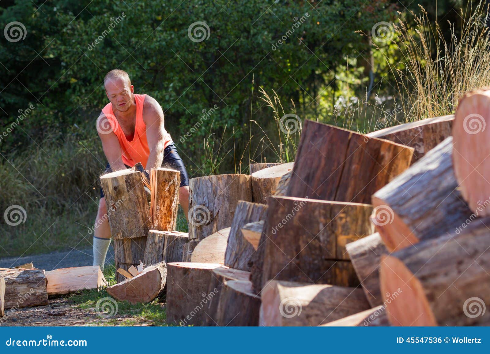 Man Splitting Wood And Cutting Firewood With Axe Stock Photography ...