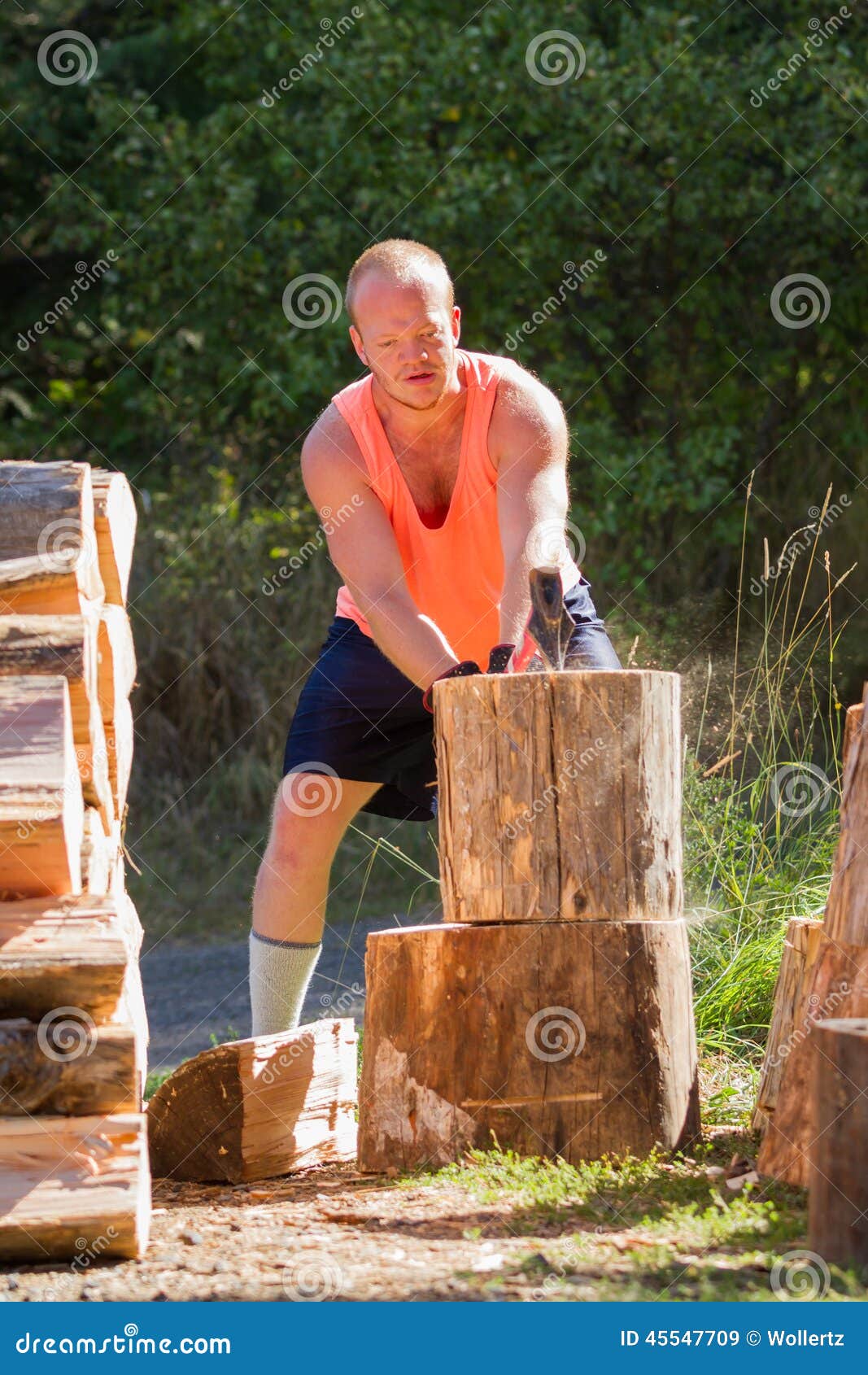 Man Splitting Wood And Cutting Firewood With Axe Stock Photography ...