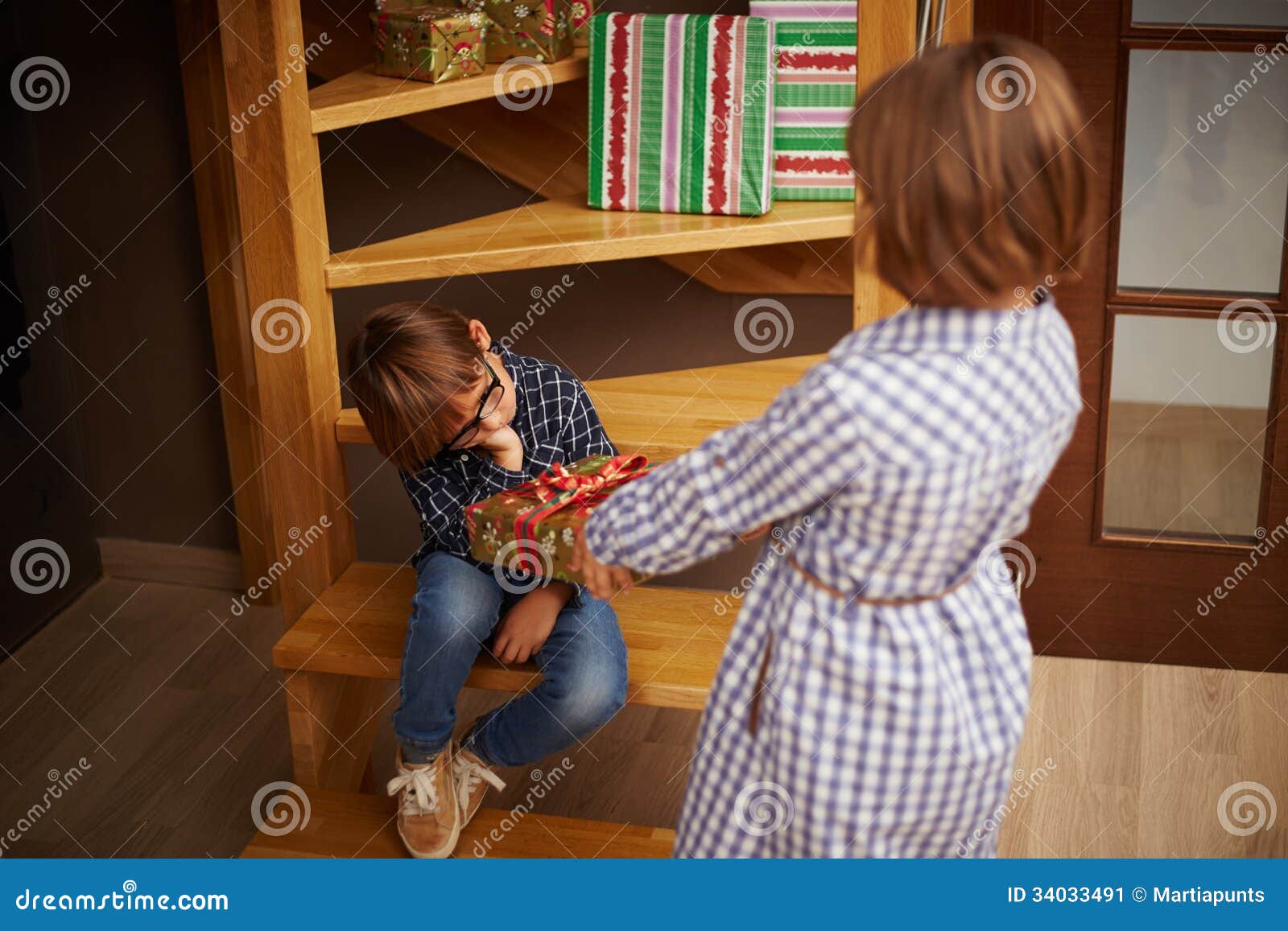 Spoiled Kid Refusing a Christmas Present Stock Image - Image of ...