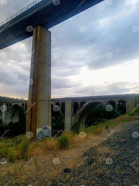 Spokane sunset bridge stock image. Image of ruins, sunset - 227824879