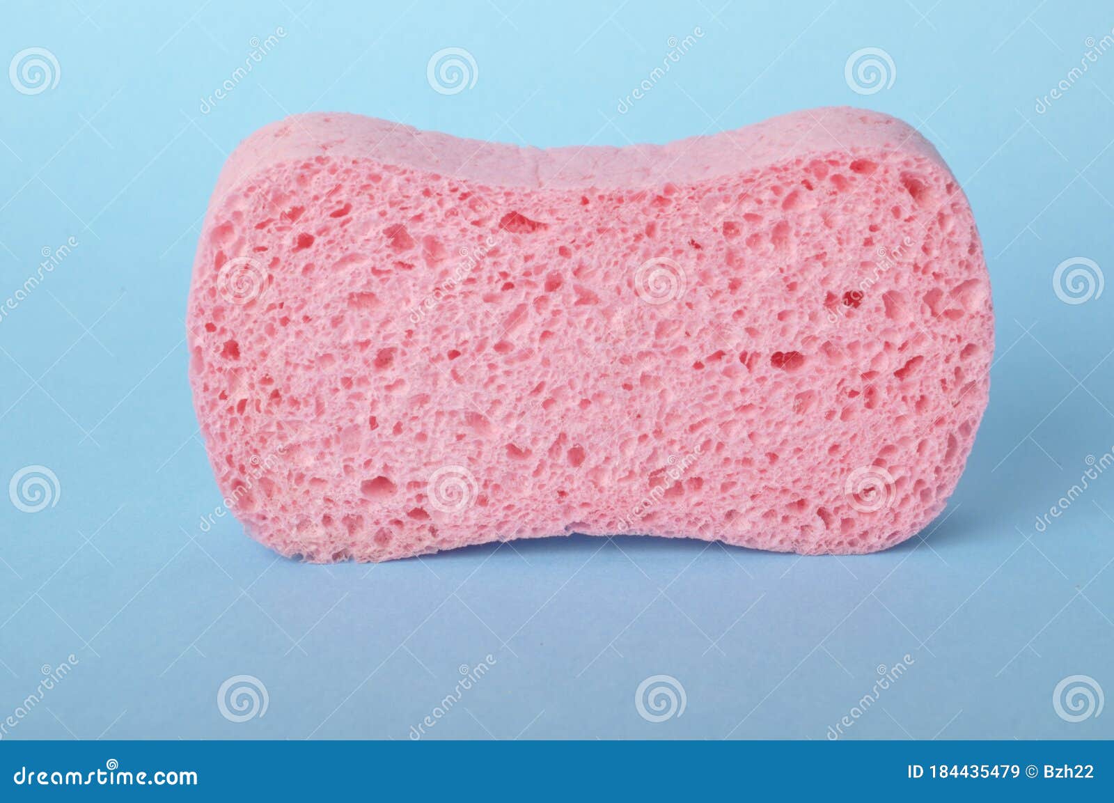 Sponge on blue background stock image. Image of domestic - 184435479