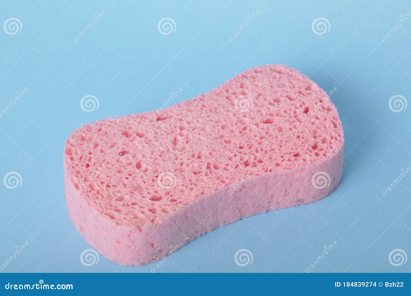 Sponge on blue background stock photo. Image of cleaning - 184839274