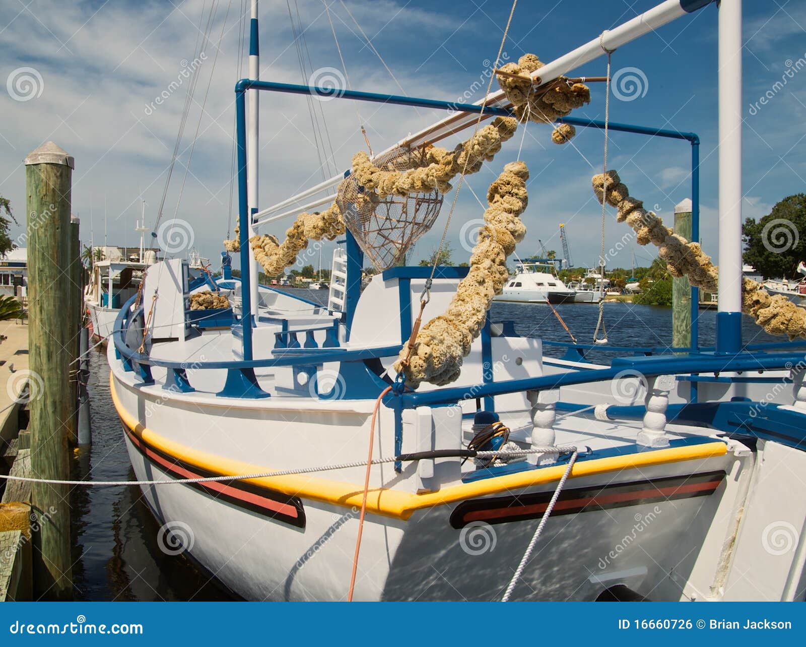 A sponge boat at the dock stock photo. Image of boating - 16660726