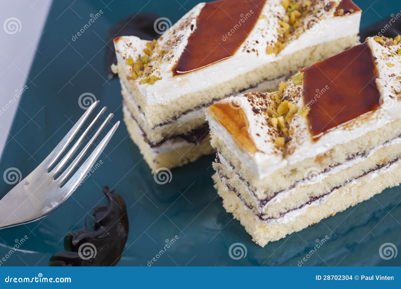Sponge cake on a plate stock photo. Image of chocolate - 28702304