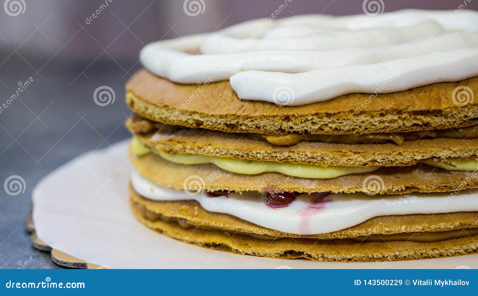 Sponge Cake with White Cream, the Process of Making the Cake, Side View ...