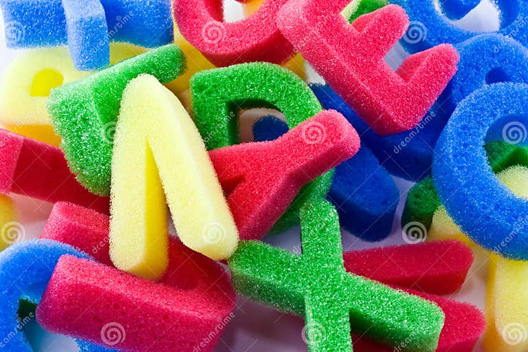 Sponge letters stock photo. Image of education, yellow - 27413288