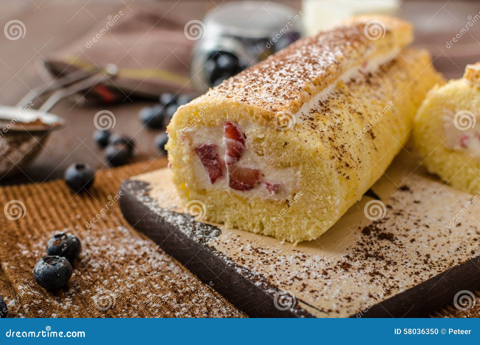 Sponge Roll Stuffed with Strawberry Cream Stock Photo - Image of ...