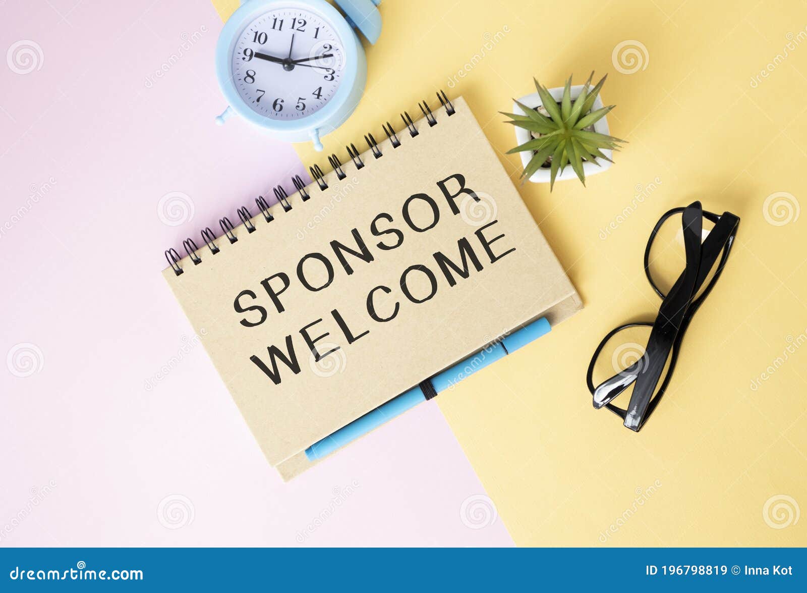 SPONSOR WELCOME Words Written on Notepad with Glasses, Alarm Clock and ...
