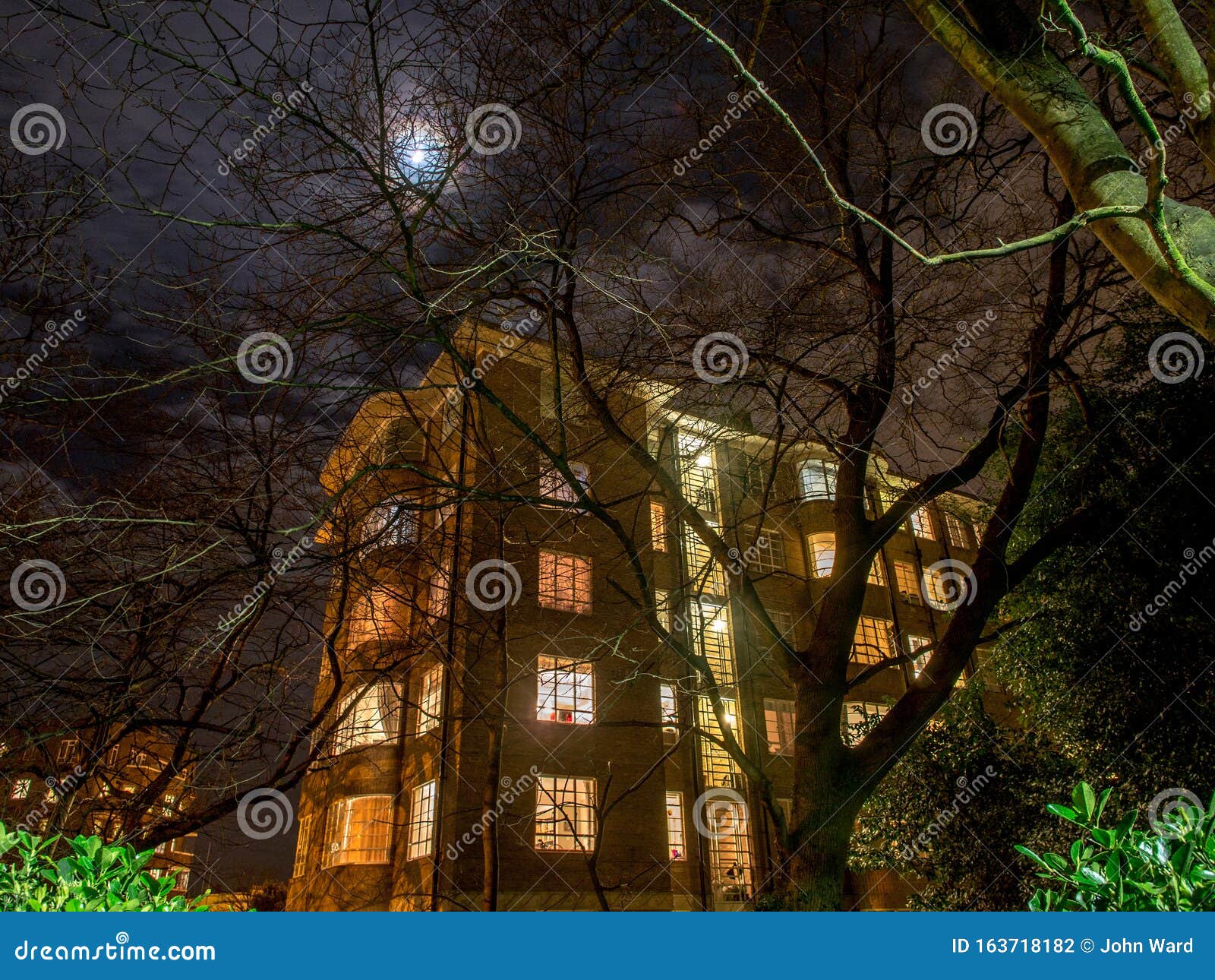 Spooky building at night stock photo. Image of flats - 163718182