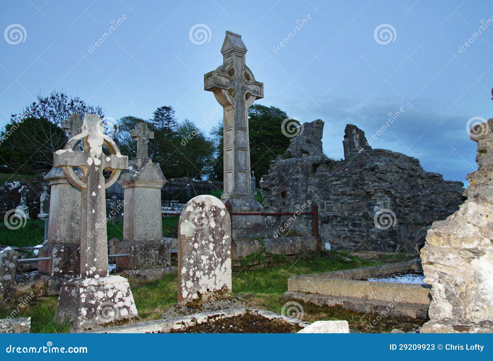 Spooky cemetery at dusk stock image. Image of dusk, headstones - 29209923