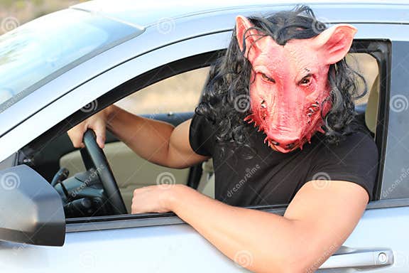 Spooky Creature Driving a Car Stock Image - Image of devil, mask: 161795213