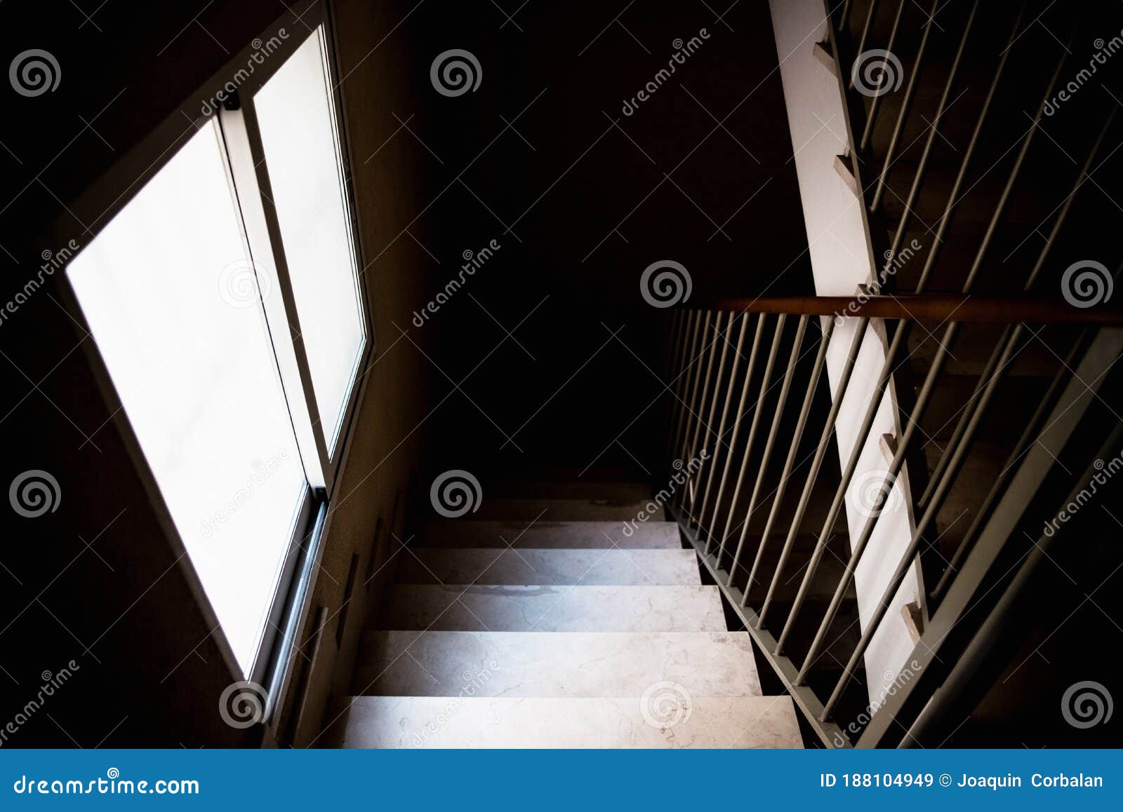 Spooky Dark View of an Interior Staircase Lit by a Window, Lonely and ...
