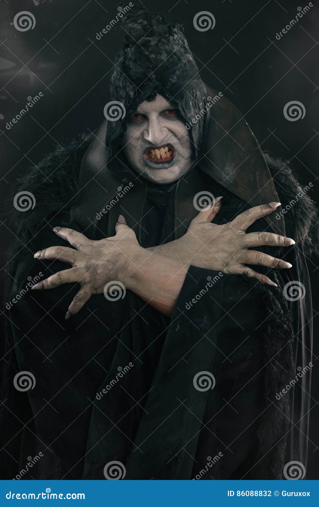 Spooky Devil Vamp with Large Scary Nails. Hell and Horror Stock Photo ...