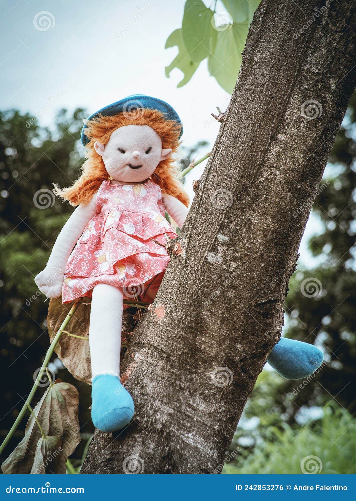 Spooky Doll Sitting on a Tree Stock Photo - Image of person, girl ...