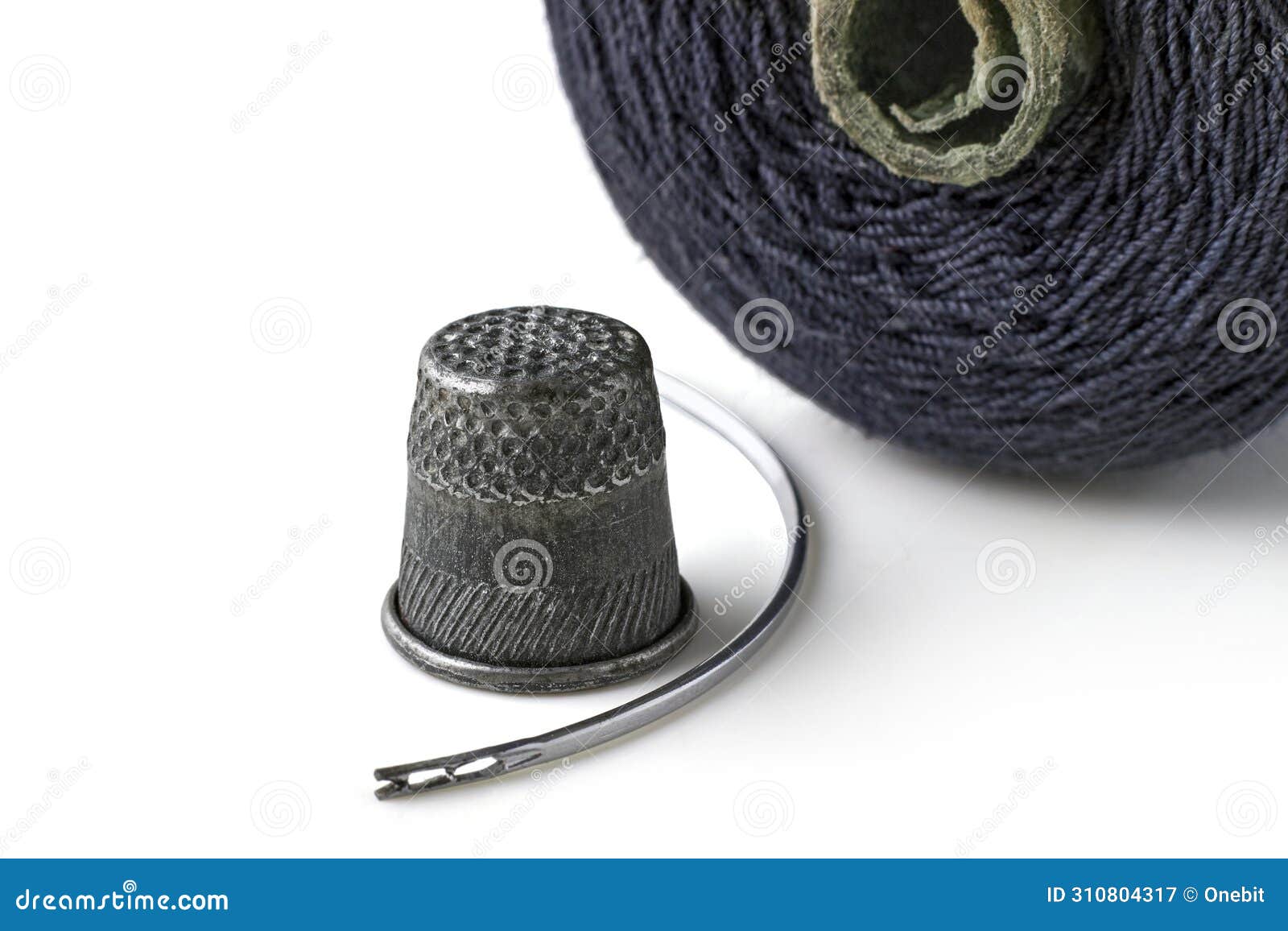 Spool of Black Coarse Thread and Curved Semicircular Needle Isolated on ...