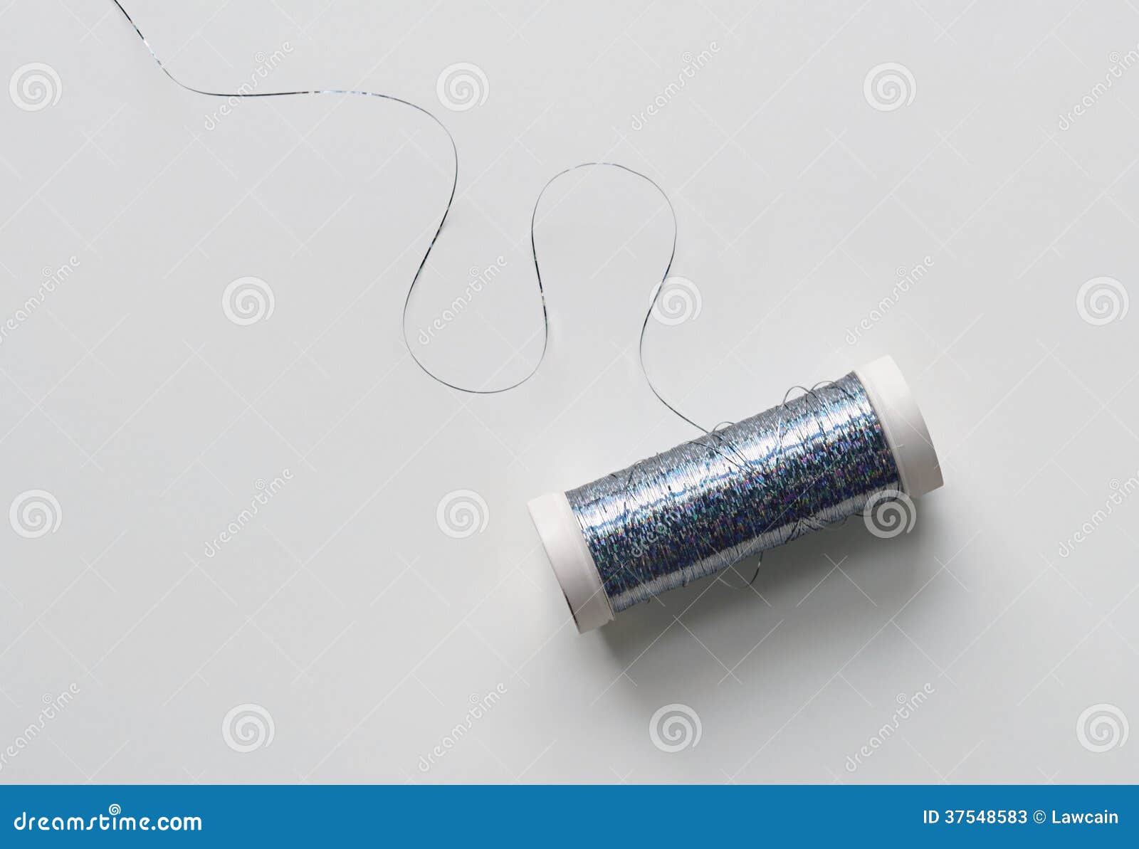 Spool of Blue Metallic Thread Stock Image - Image of color, unwound ...