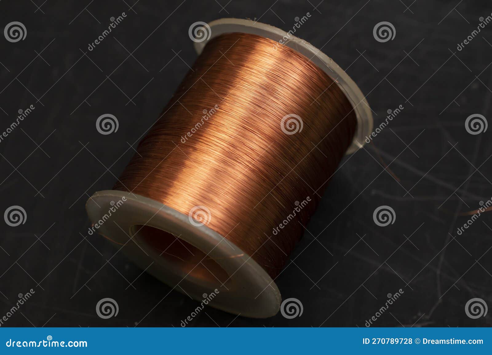 Spool of Copper Wire on a Black Background Stock Photo - Image of ...