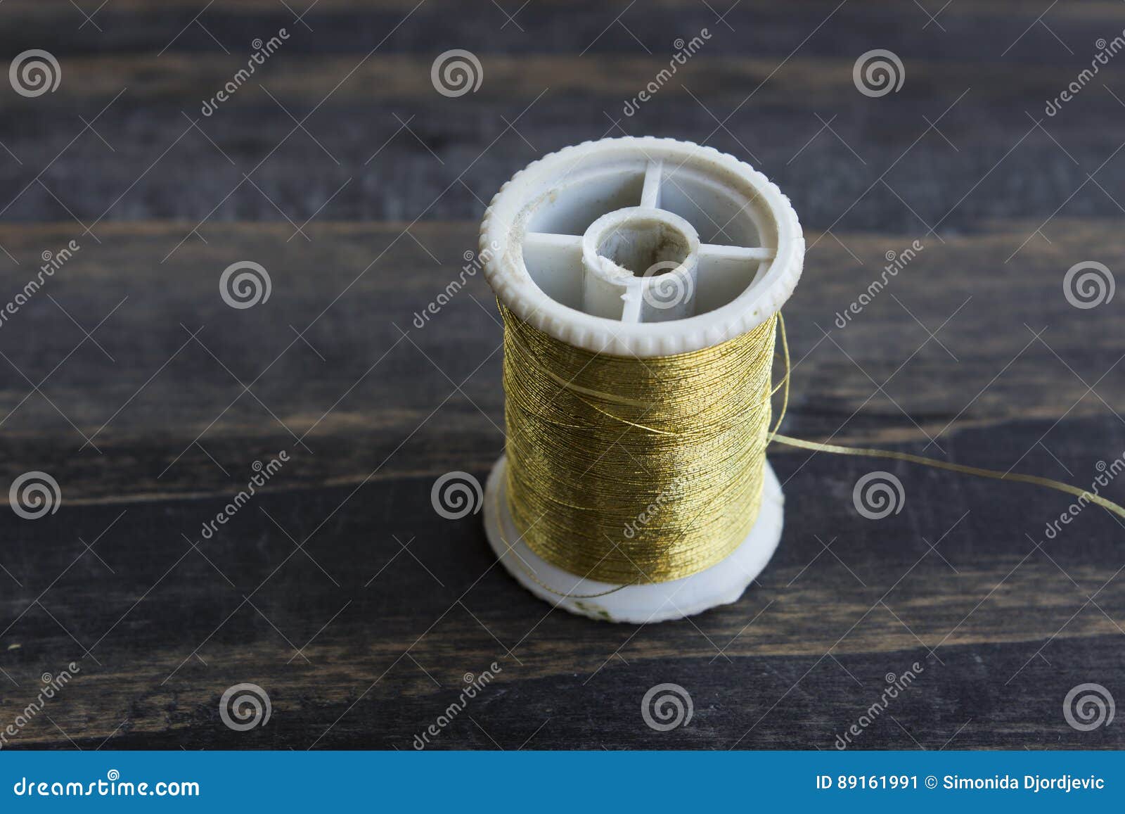 Spool of Golden Thread stock image. Image of wooden, gold - 89161991