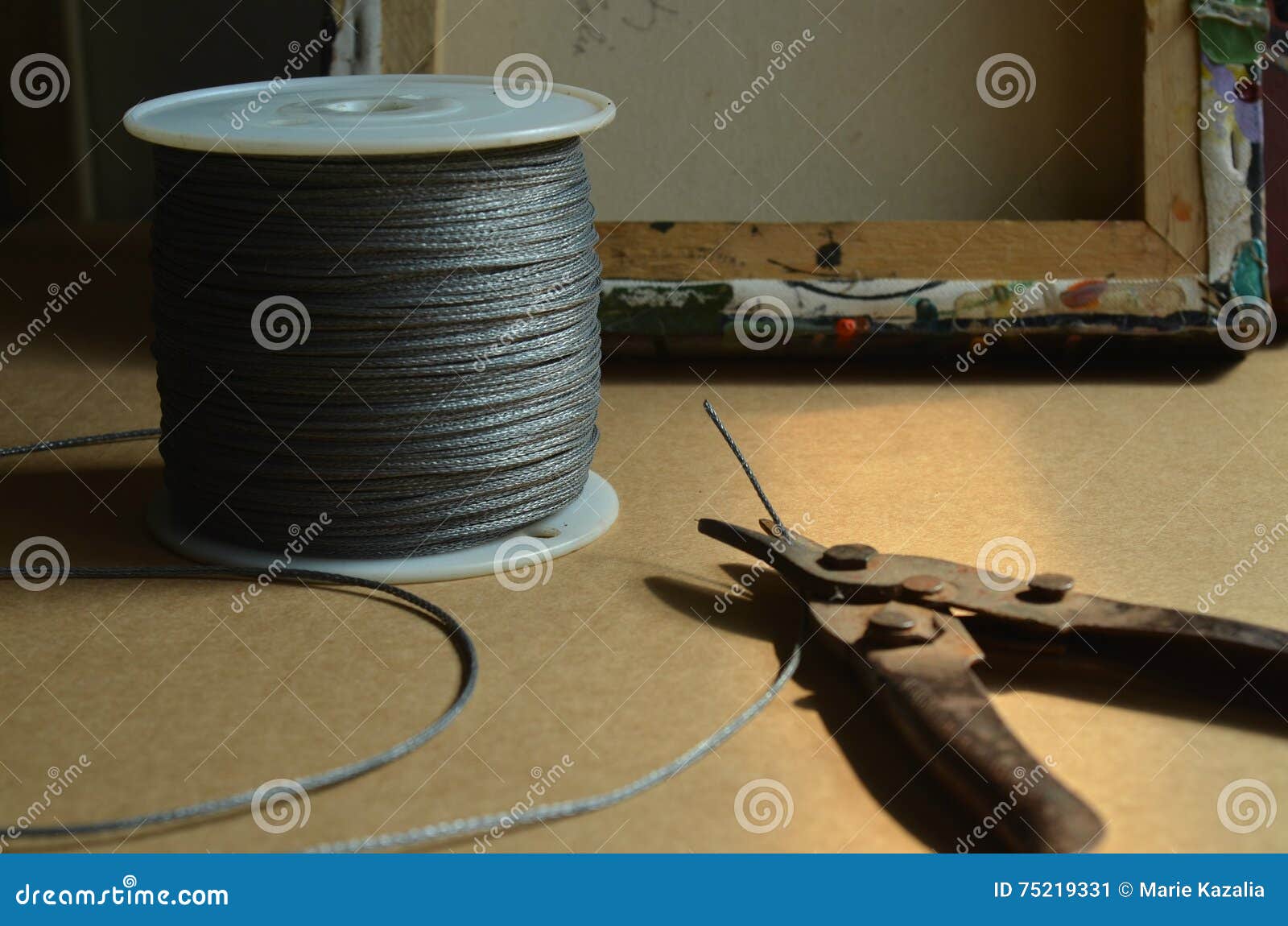 Spool of Picture Hanging Wire, Wire Cutters, Back of Stretched Canvas ...