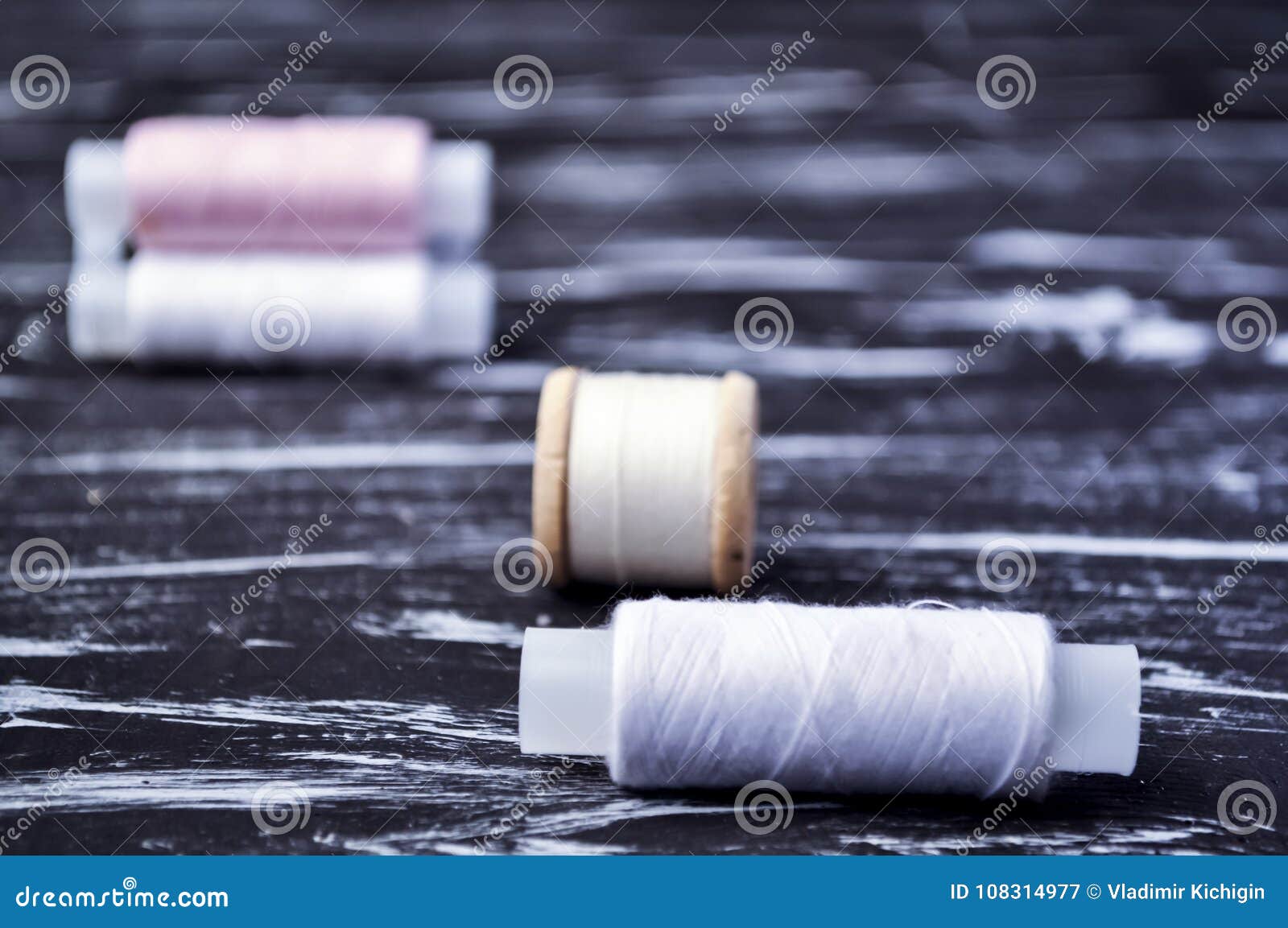 The Spool of Thread on the Table. Thread on a Reel for Craft. Ma Stock ...