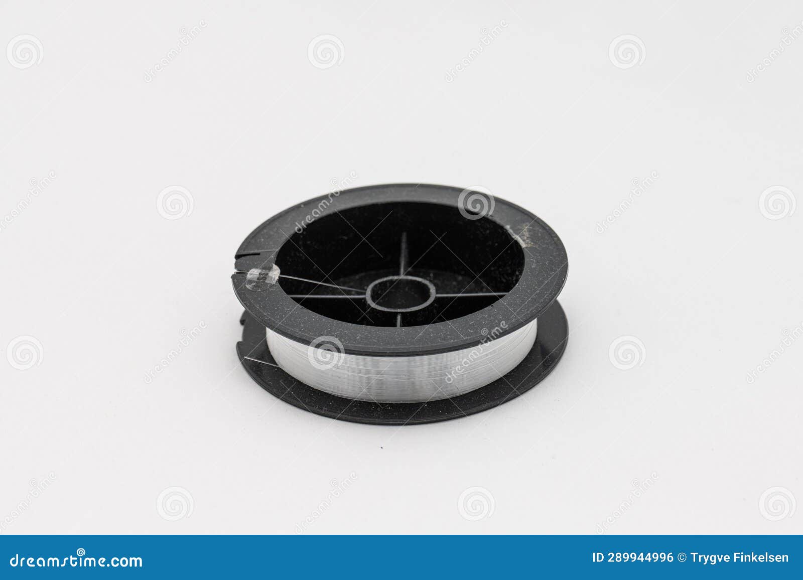 Spool of Transparent Fishing Line.. Stock Photo - Image of blue, macro ...