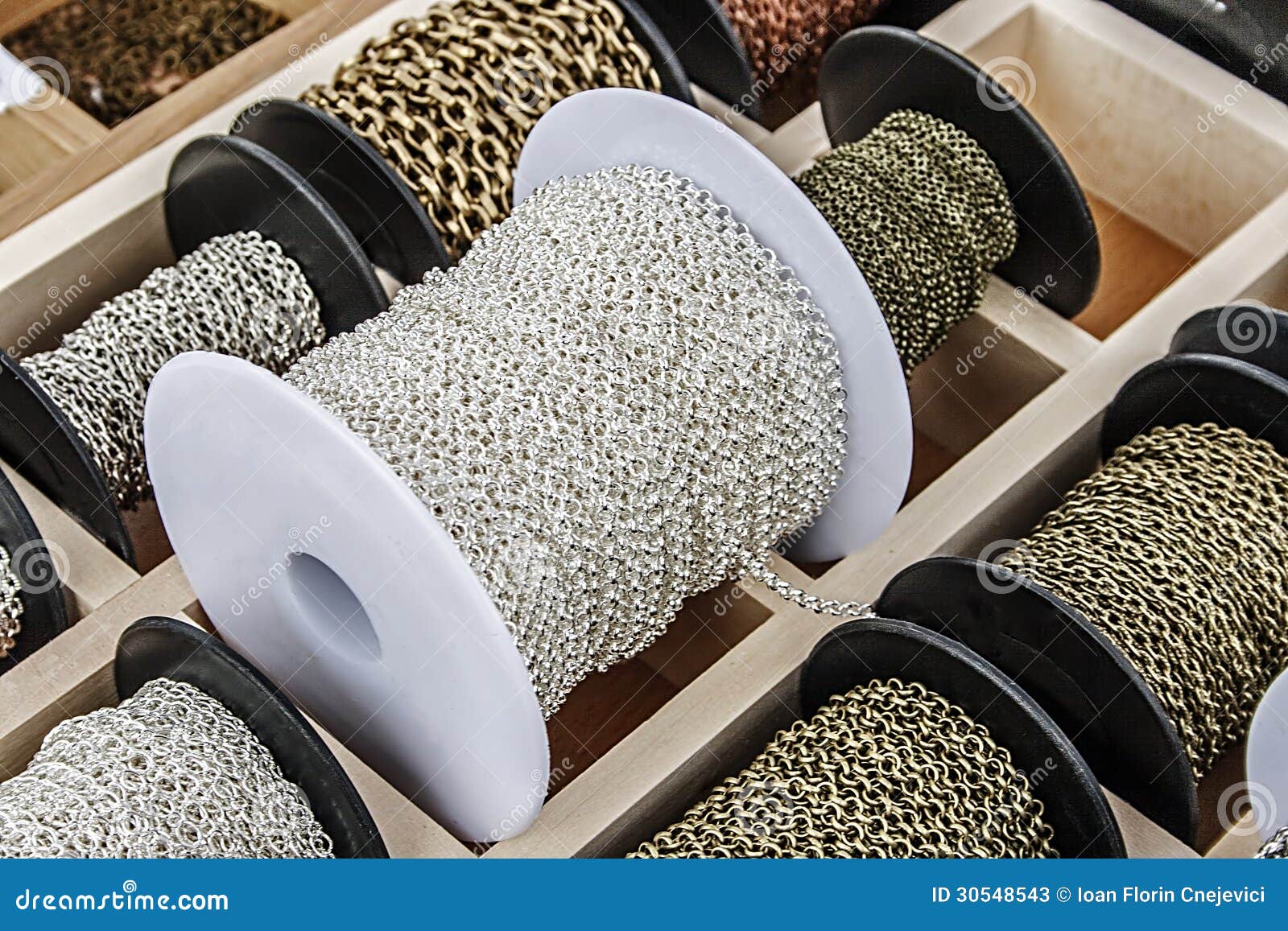 Spools with chains 2 stock image. Image of manufacture - 30548543