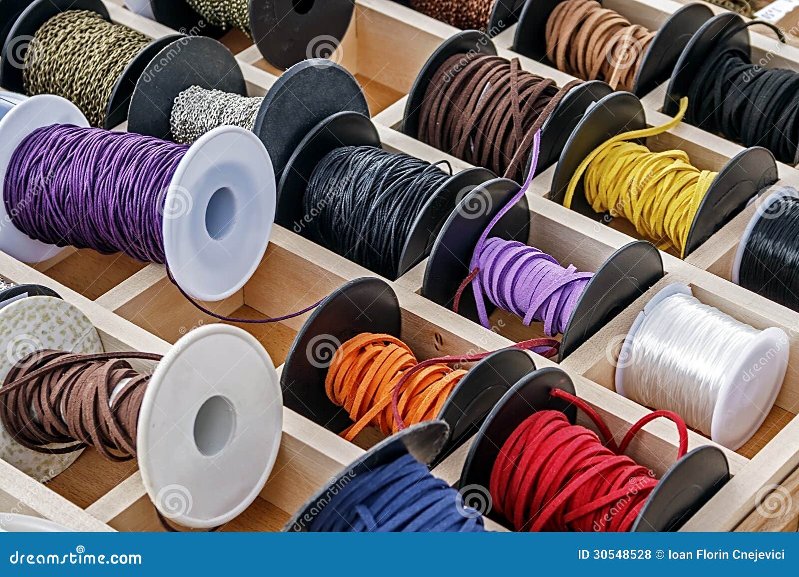 Spools with Chains and Colored Ribbons 1 Stock Photo - Image of ribbons ...