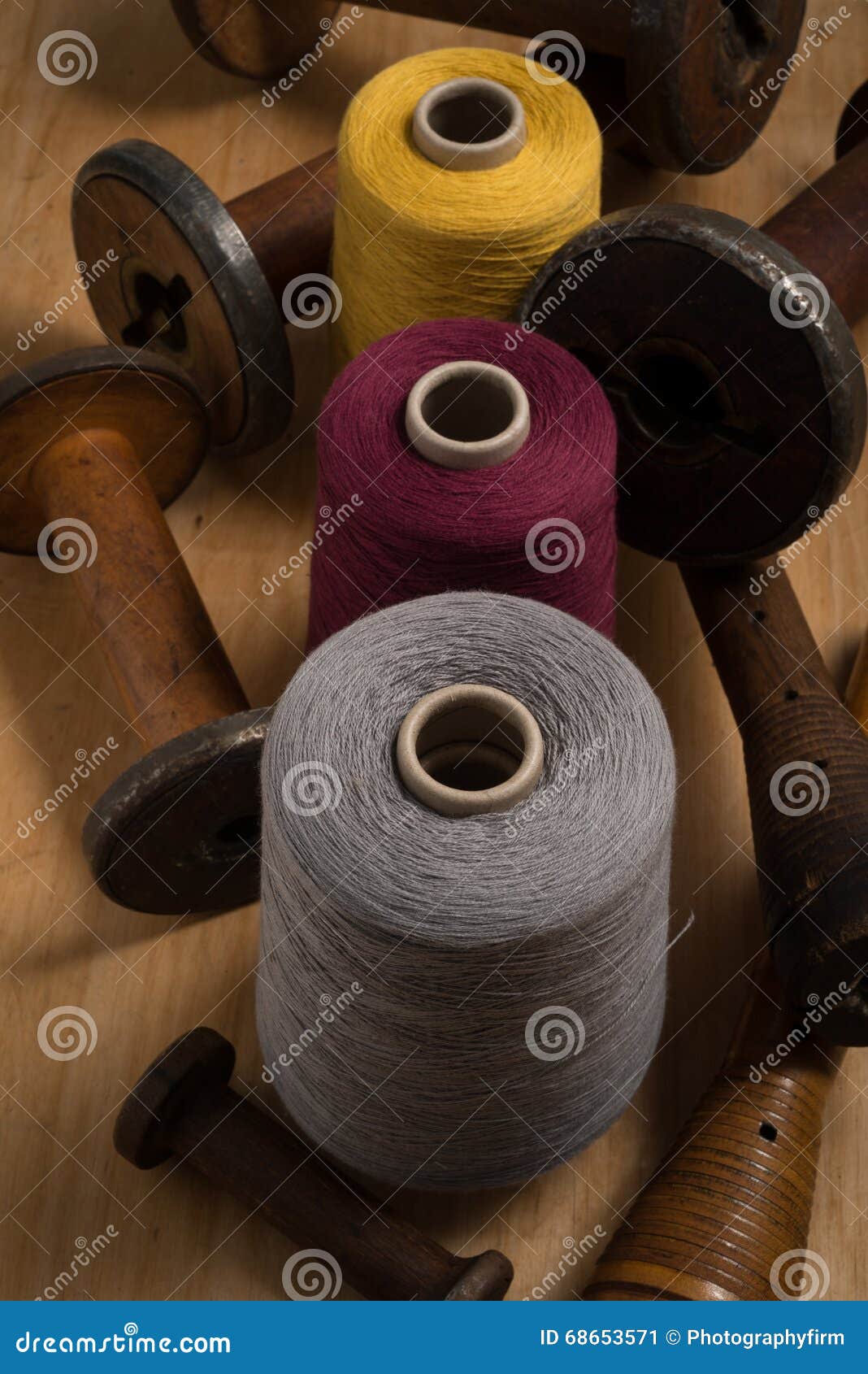 Spools of Color Thread Aligned Vertically with Wooden Spools Stock ...