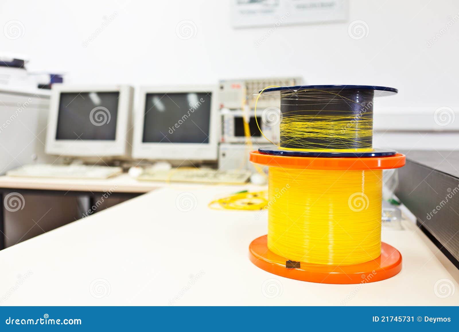 Spools of Optic Fiber Cable on the Desk Stock Image - Image of light ...