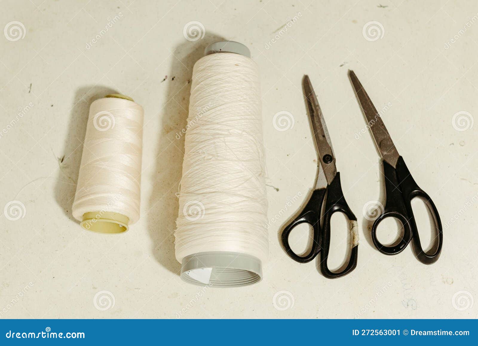 Spools of Thread Arranged Neatly on a Flat Surface, with a Soft Natural ...