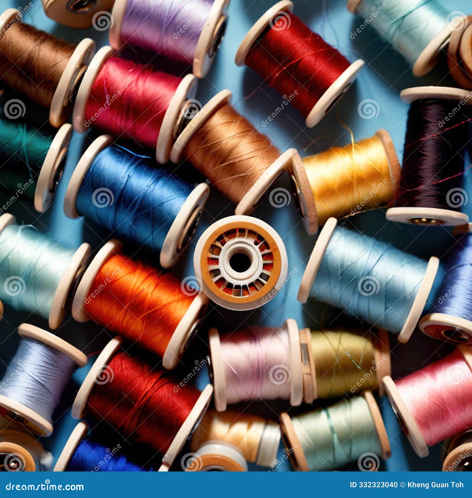 Spools of Thread and Buttons on Light Blue Background Stock ...