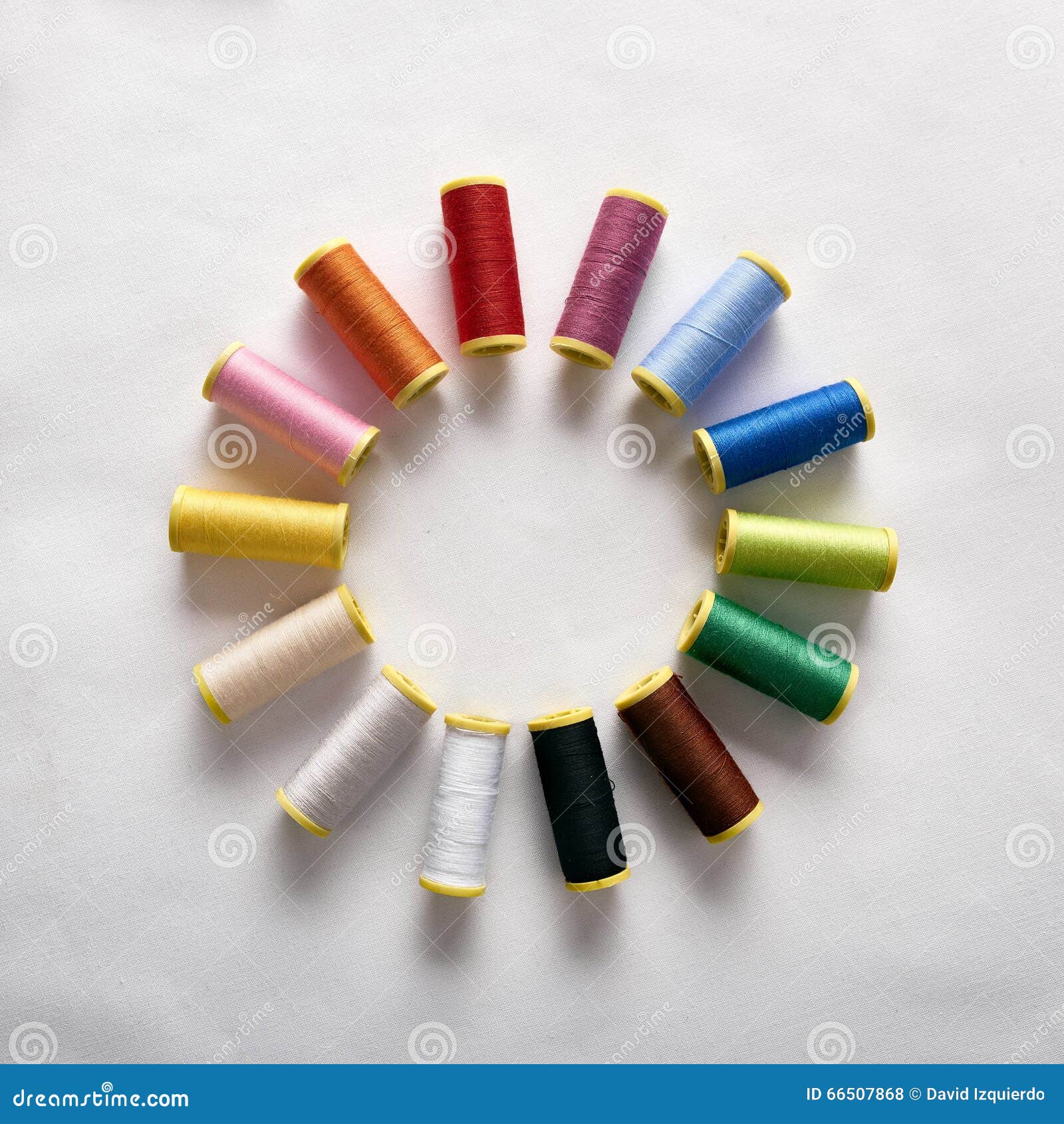 Spools of thread in circle stock photo. Image of working - 66507868