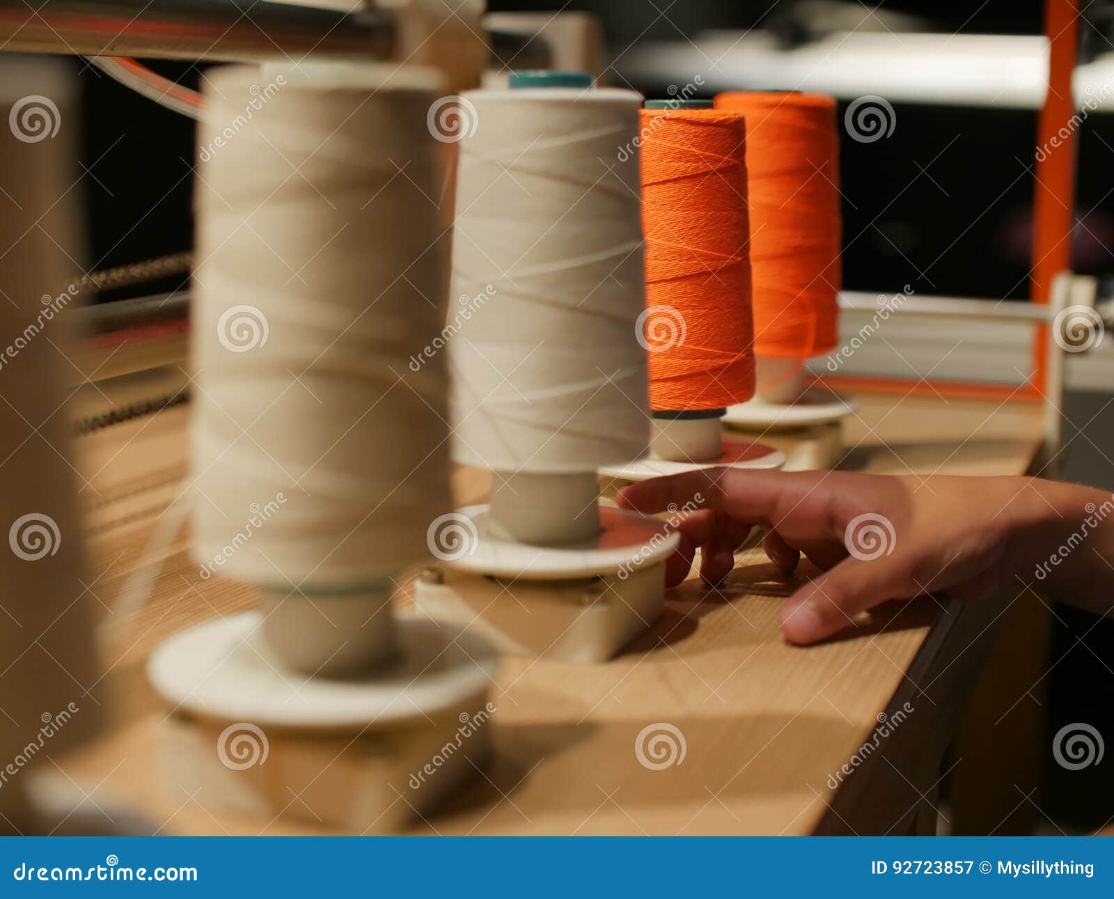 Spools of Thread Display on Wood Table in Factory Stock Image - Image ...
