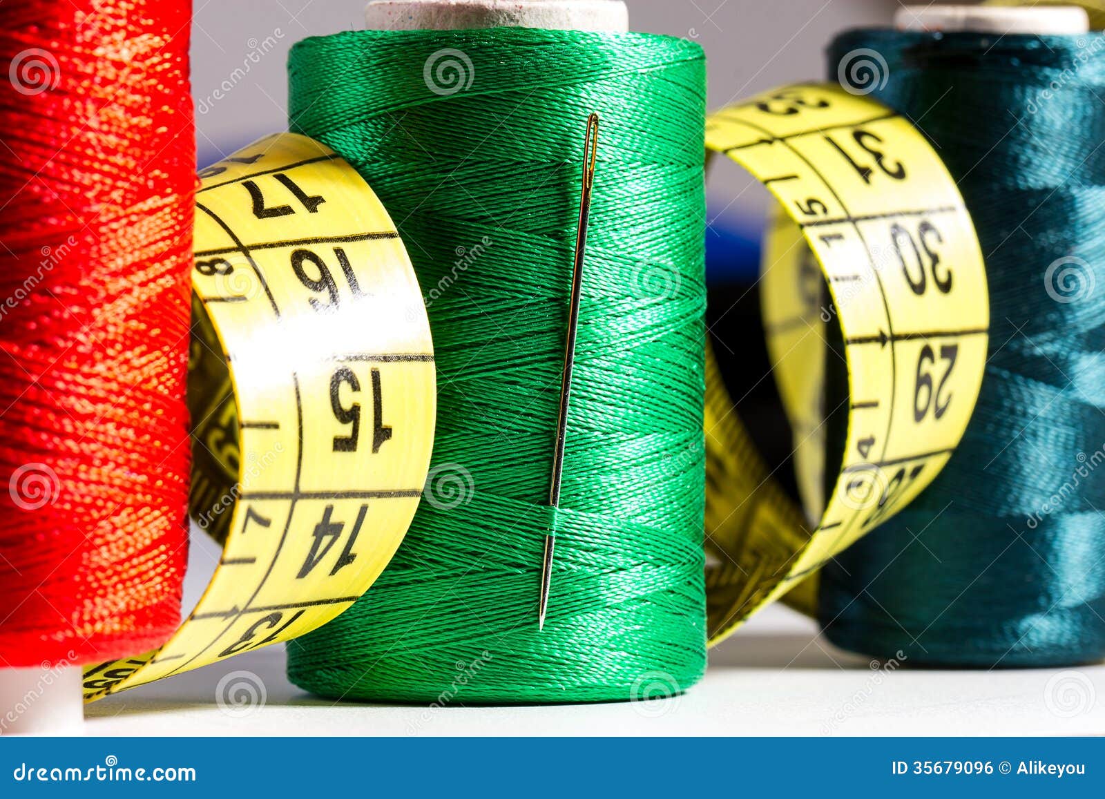 Spools of Thread, Needle, Measuring Tape, Button Stock Photo - Image of ...
