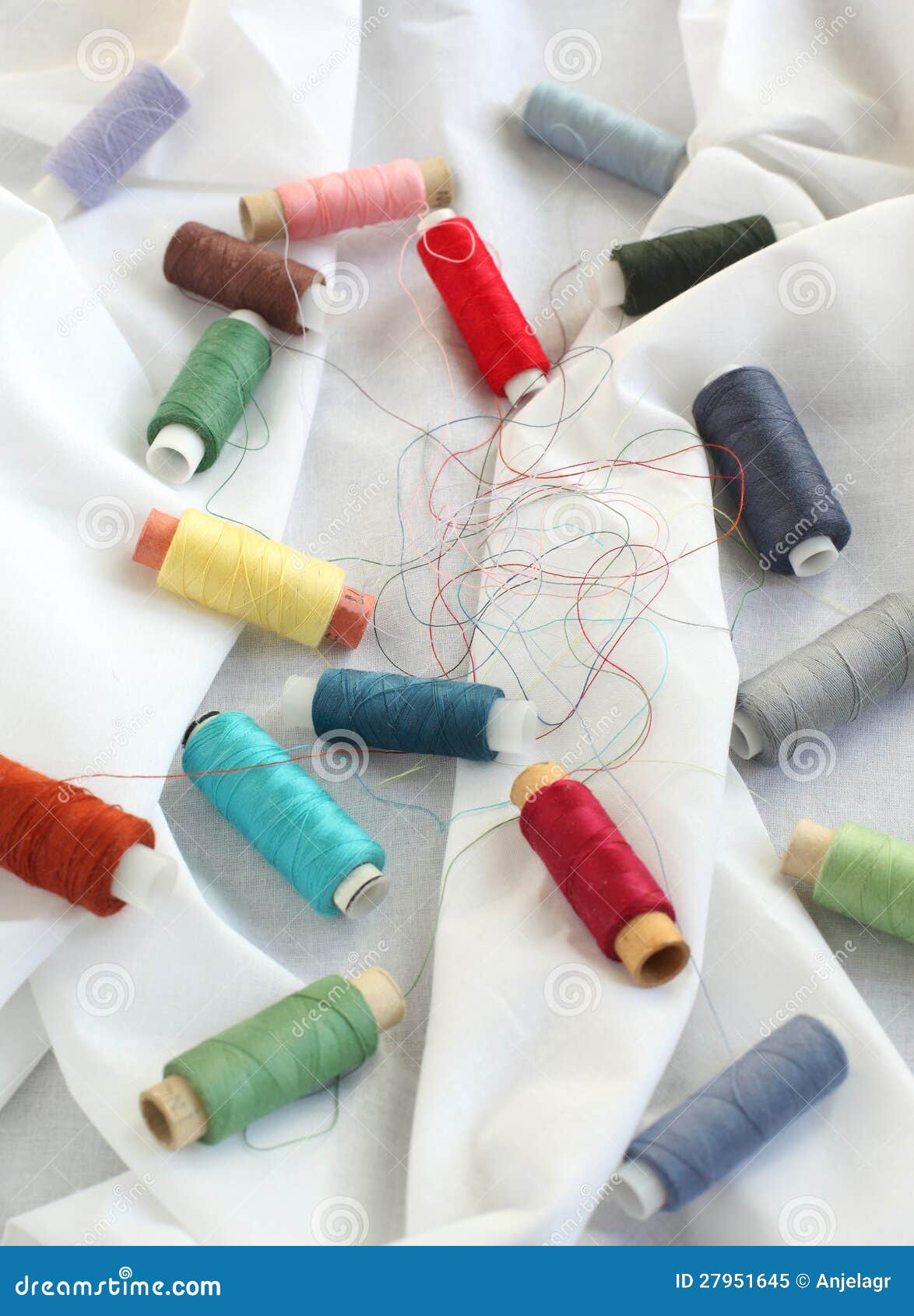Spools of Threads on a Cotton Fabric Stock Image - Image of industry ...