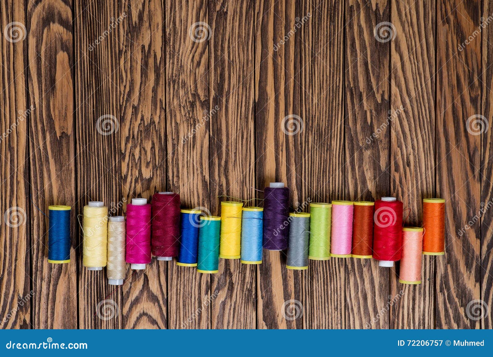 Spools of Threads on Wooden Background. Stock Image - Image of ...