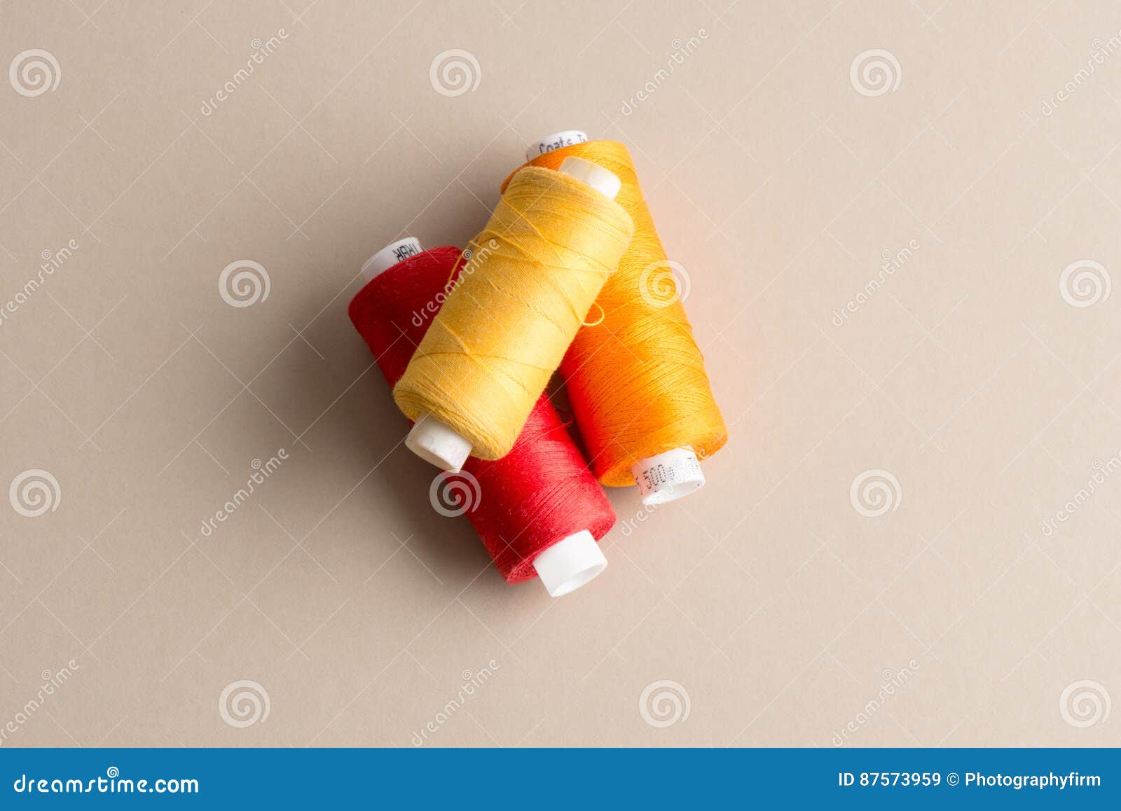 Spools of Yellow, Red, and Orange Thread Stock Image - Image of fiber ...